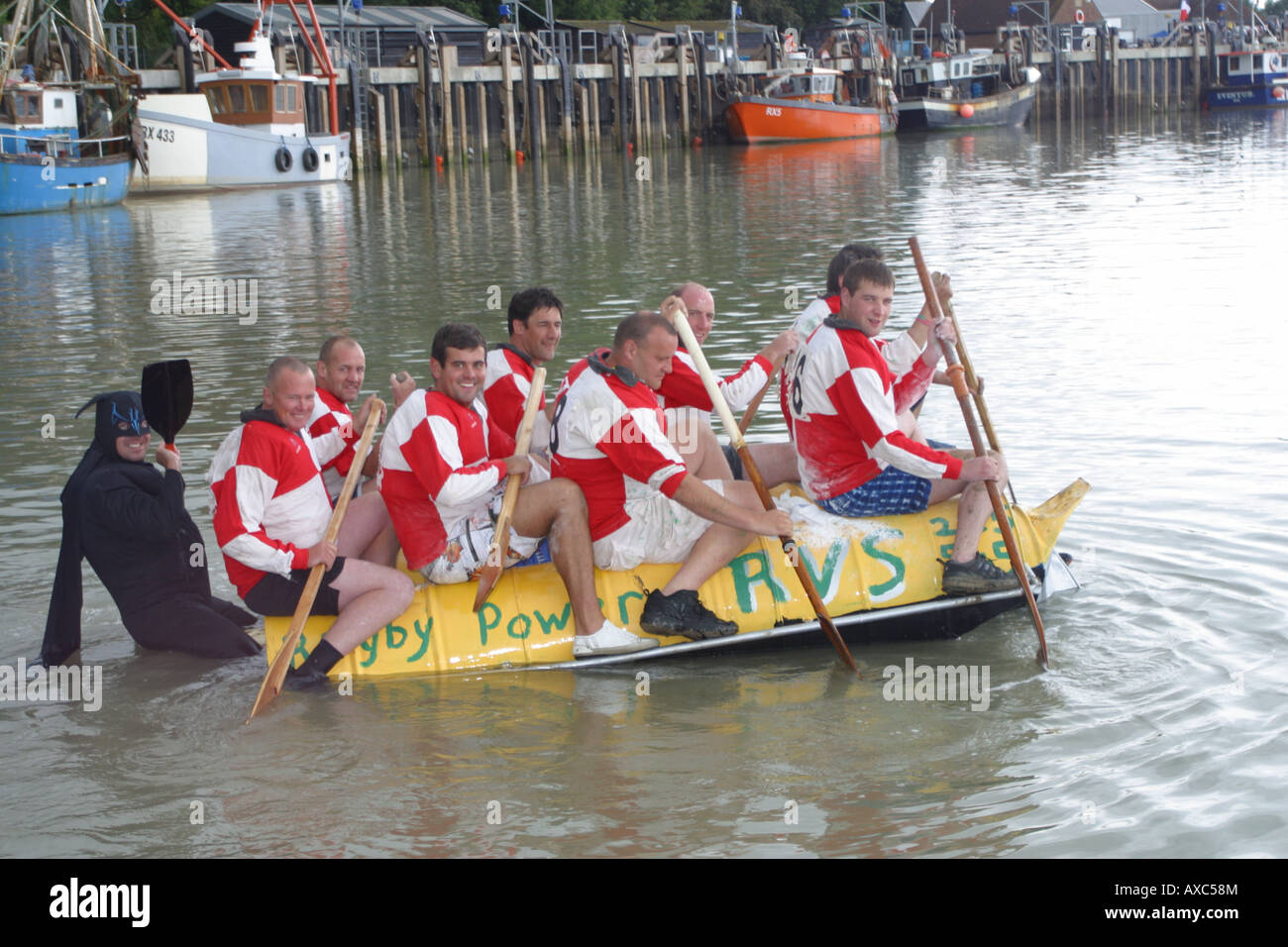 raft race competitors rowing river paddles water Stock Photo - Alamy