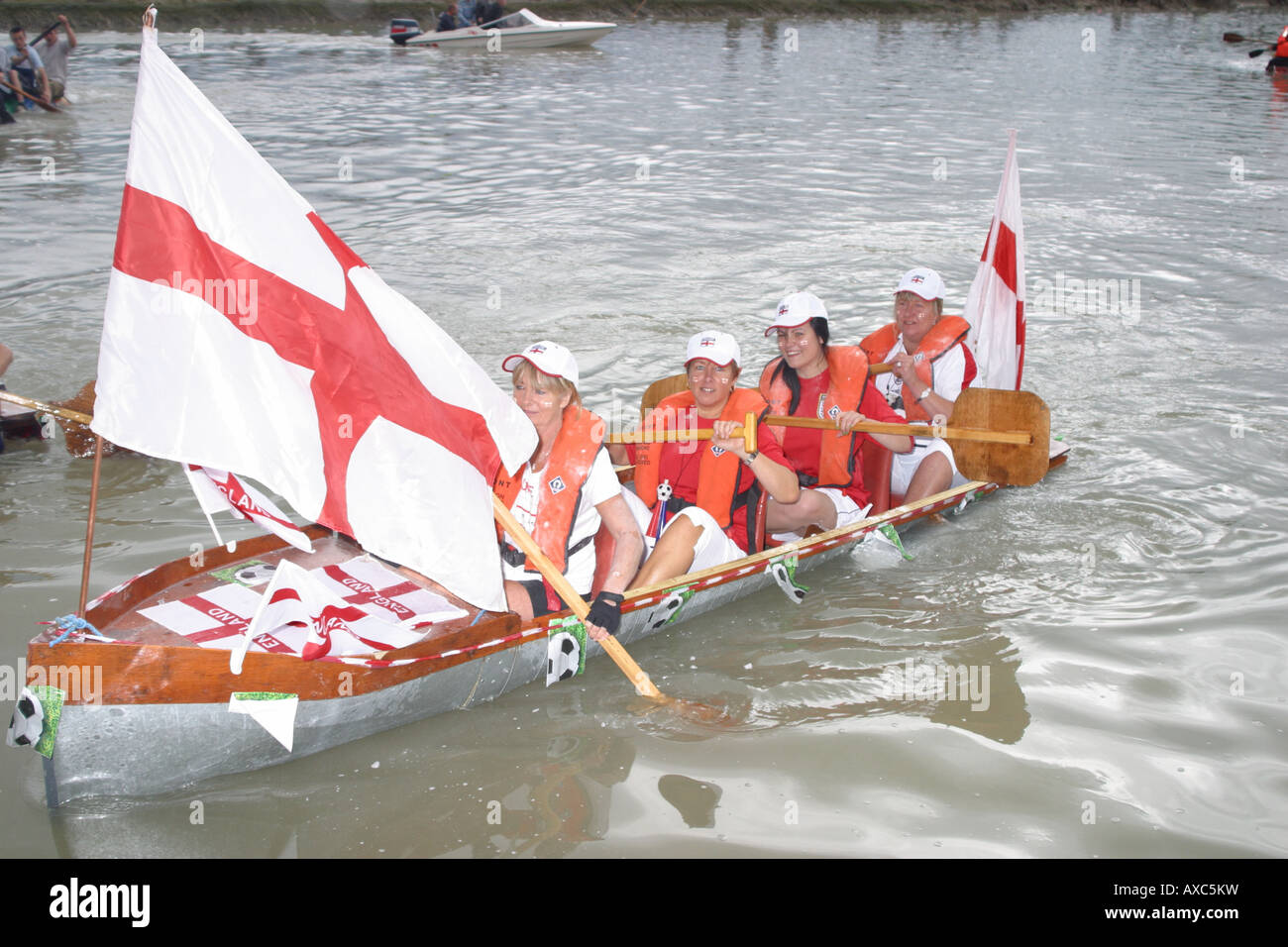 raft race competitors rowing river english flag Stock Photo - Alamy