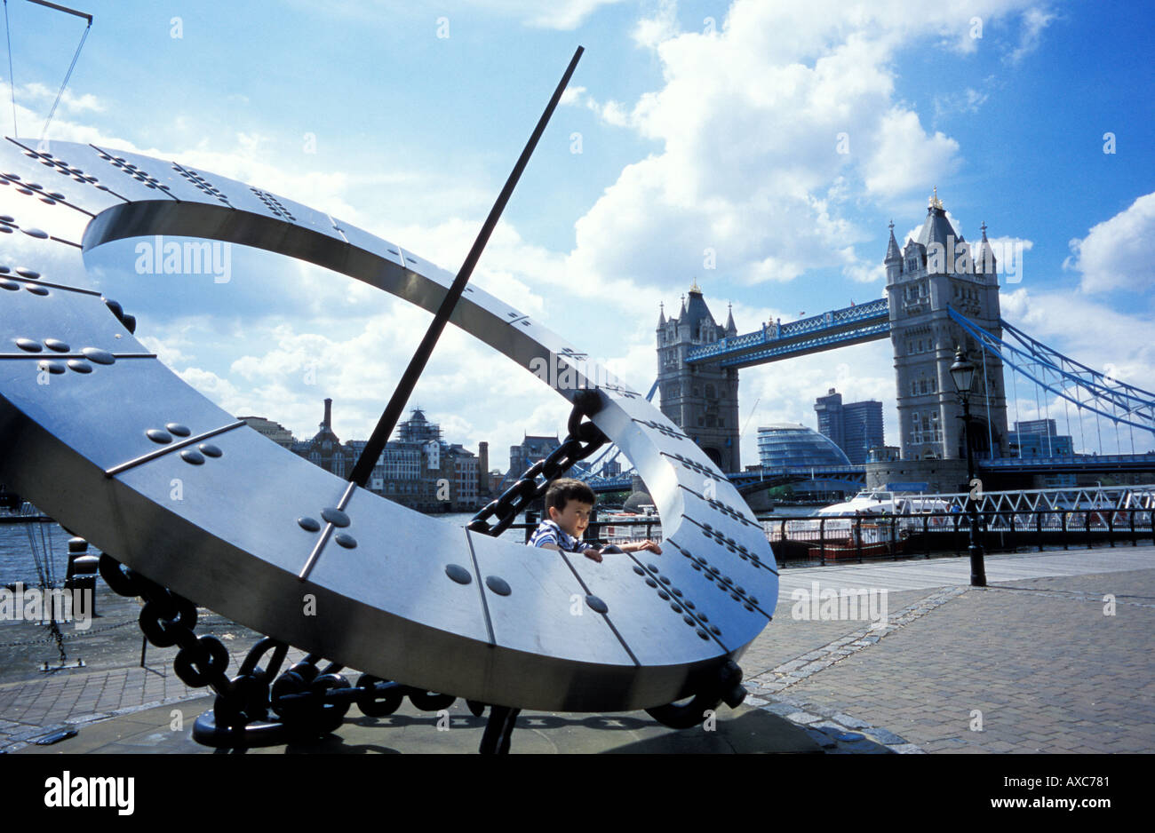 Tower Bridge and Sundial with child London England Stock Photo - Alamy
