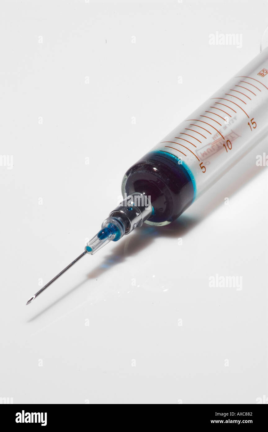 Hypodermic syringe and needle with liquid Stock Photo - Alamy
