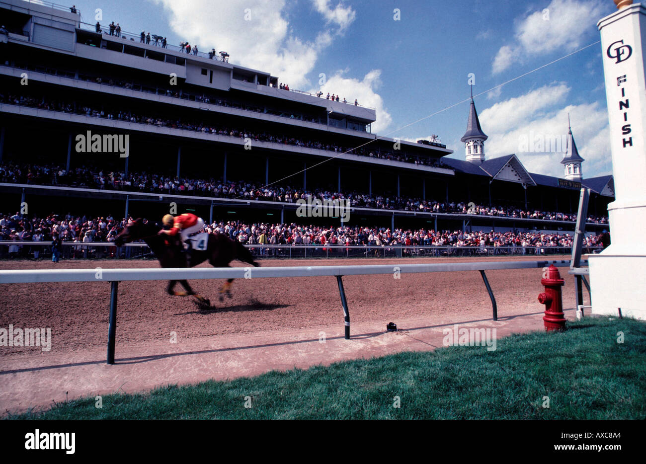 Winning horse crossing the finish line during horserace at Churchcill ...