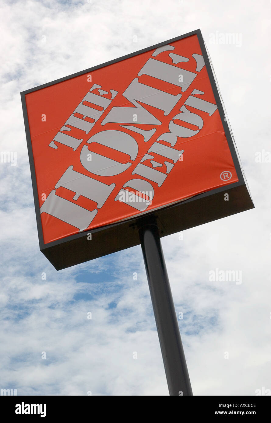 The Home Depot retail store sign beneath a cloudy sky, symbolizing ...