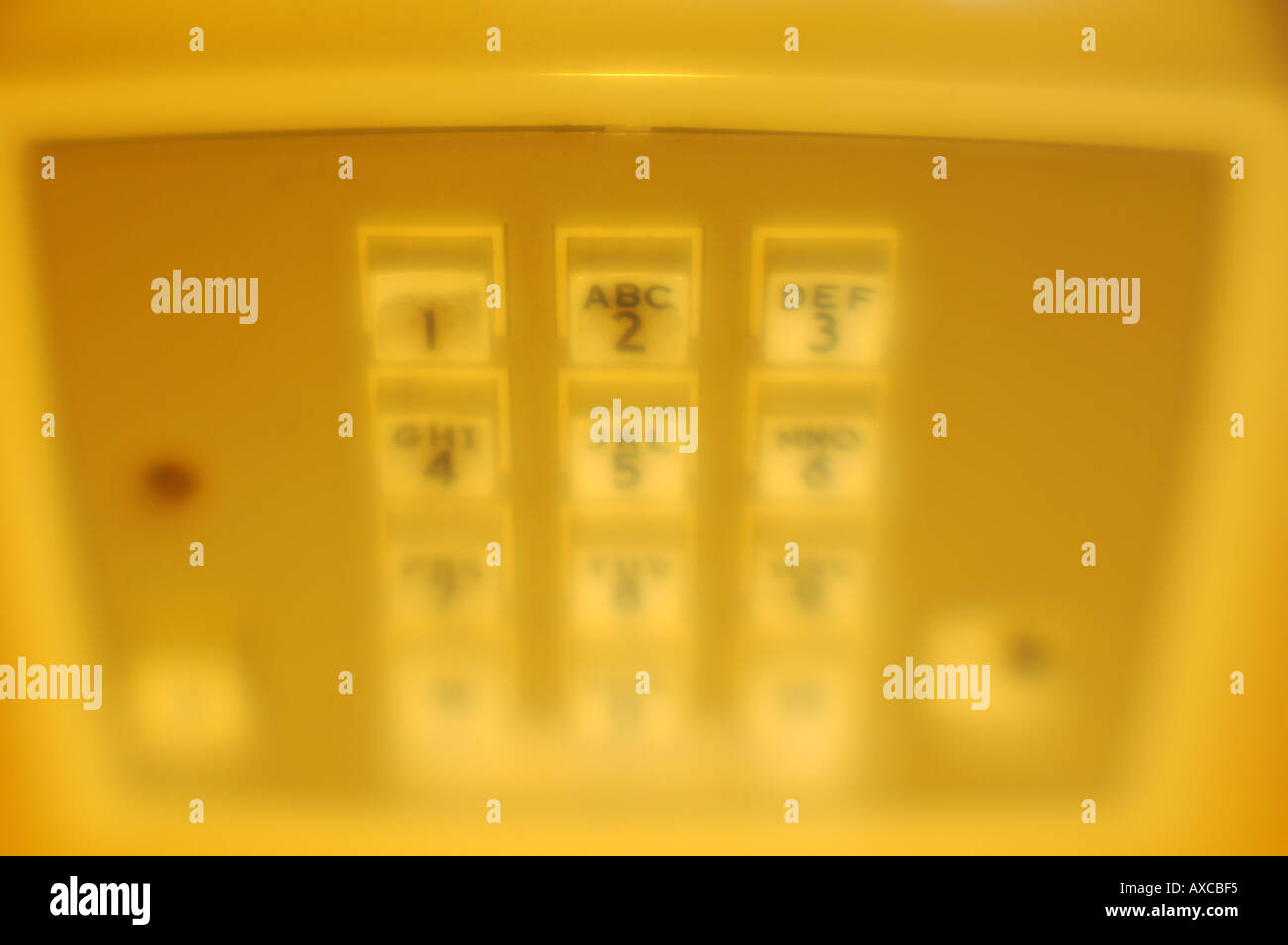 Communication concept idea strange angle on an office phone key pad ...