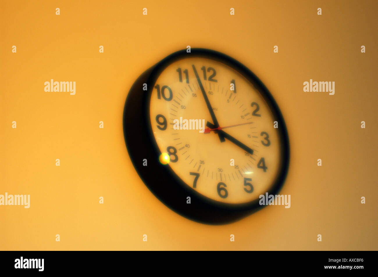 office wall clock idea in an office cubicle Stock Photo - Alamy