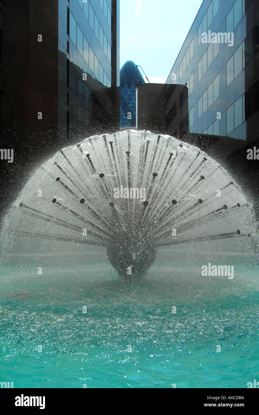 City of London water fountain in pedestrian square within modern office ...