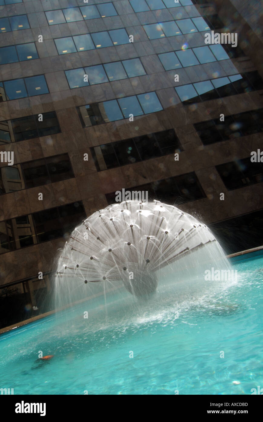 City of London water fountain in pedestrian square within modern office ...