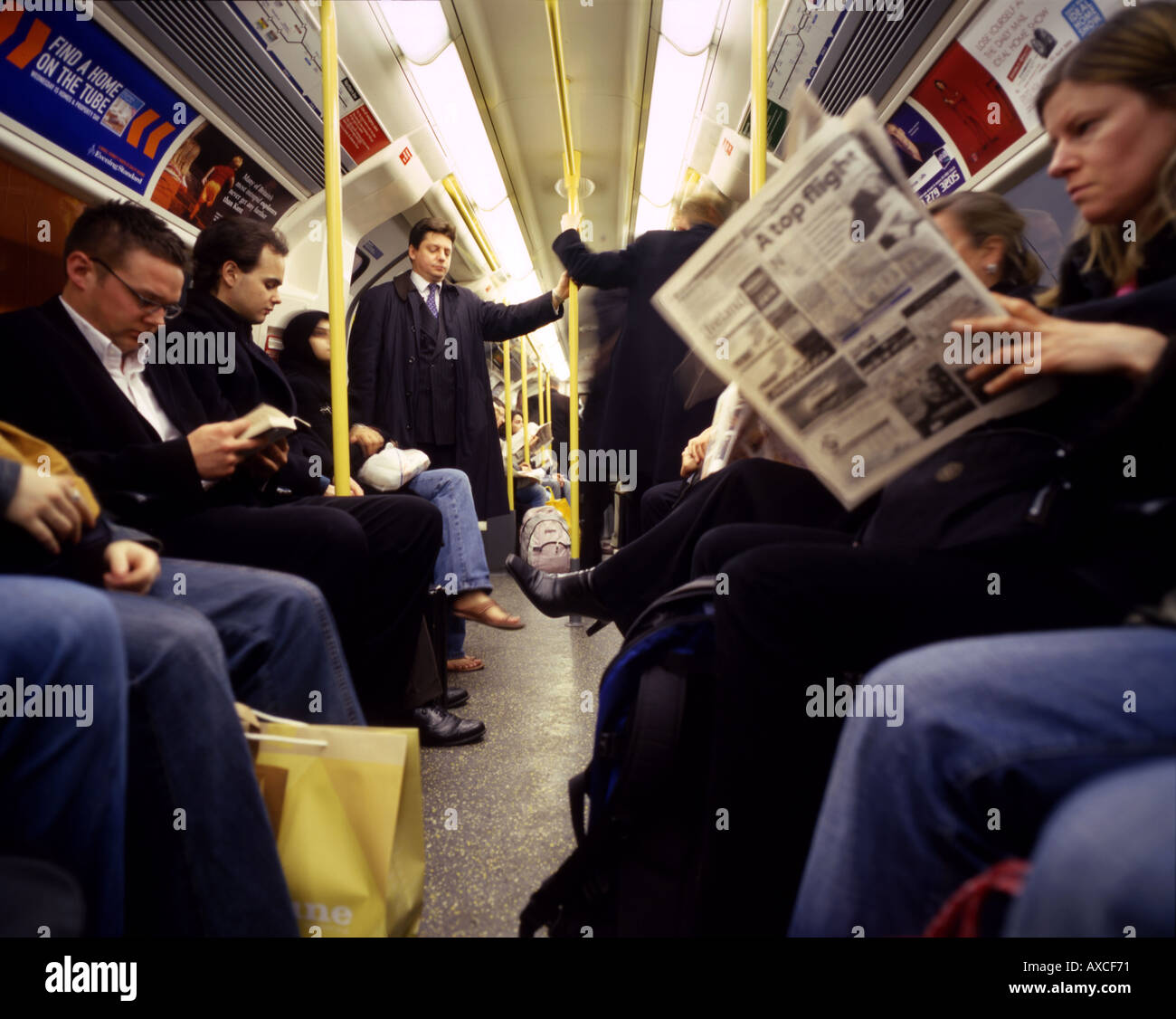 Commuters on the London Tube Northern Line Stock Photo - Alamy