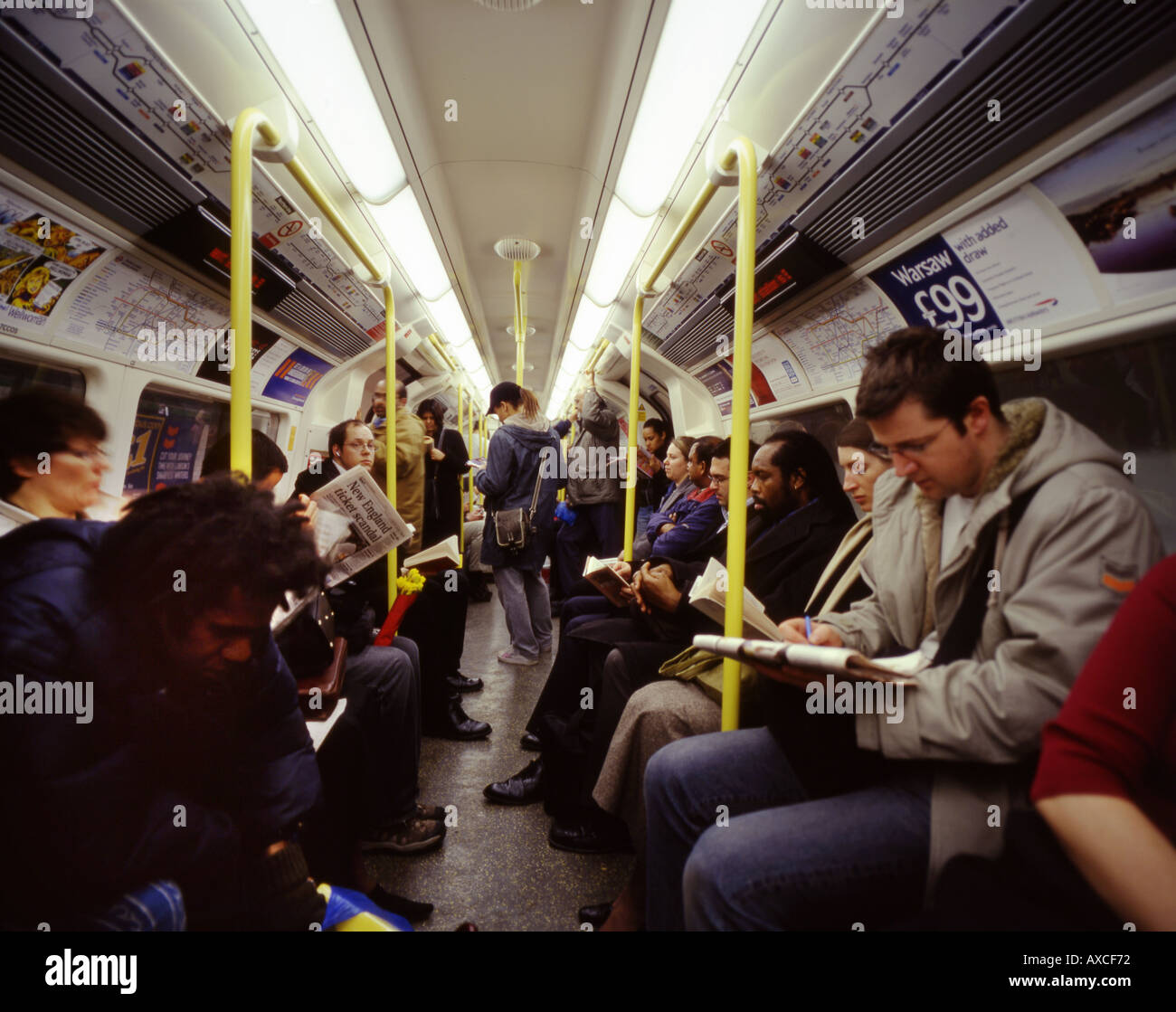 Commuters on the London Tube Northern Line Stock Photo - Alamy