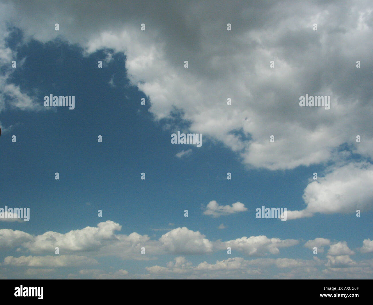cloud formations blue sky Stock Photo - Alamy