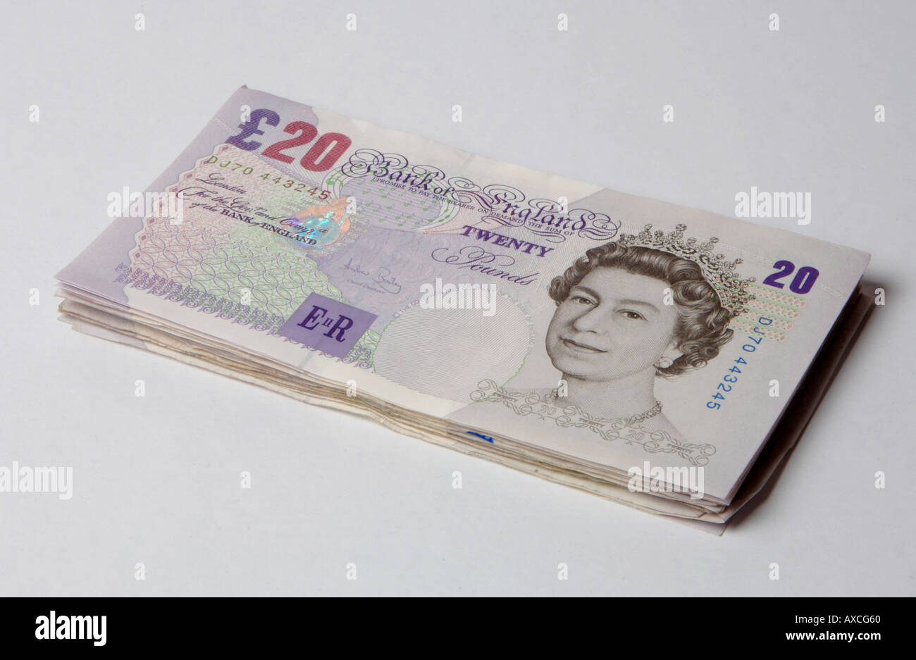 cash £20 notes in a stack or pile Stock Photo - Alamy