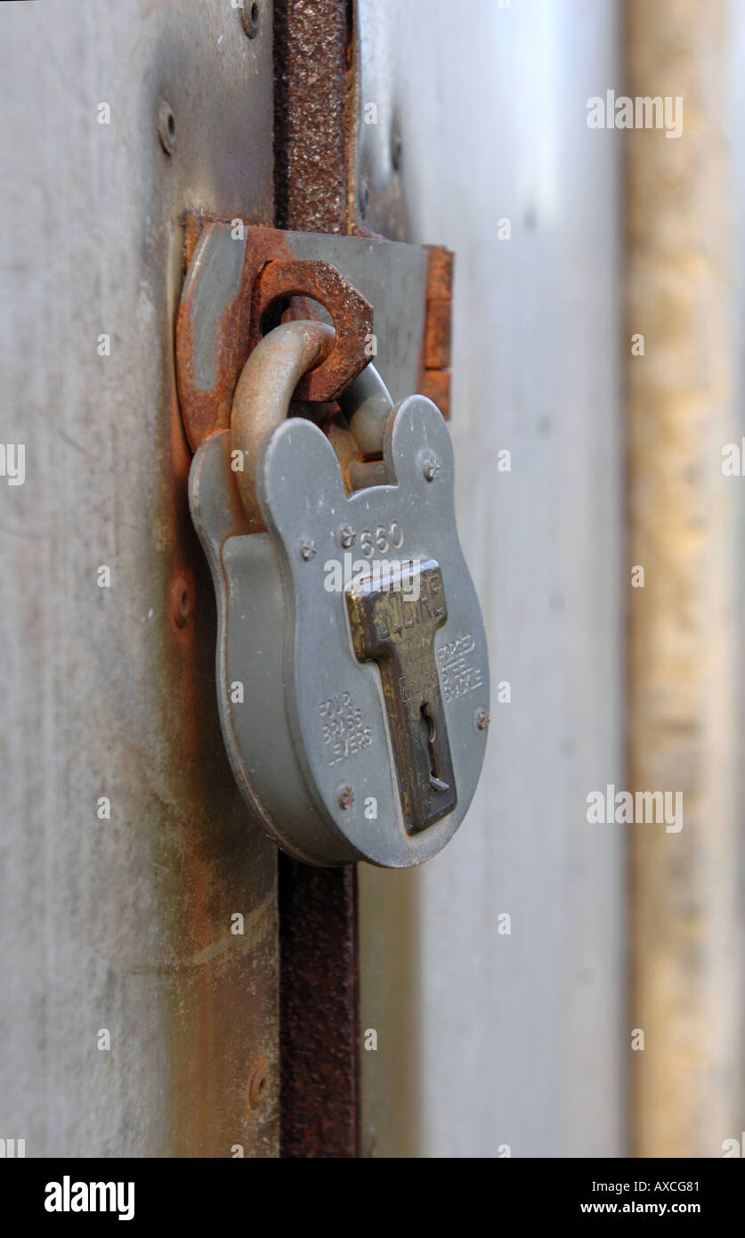 padlock securing a door shut Stock Photo - Alamy