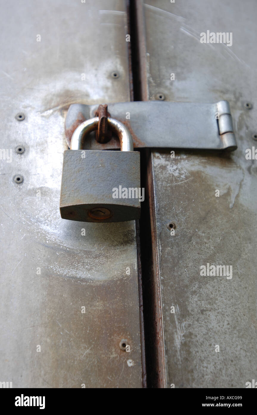 padlock securing a door shut Stock Photo - Alamy