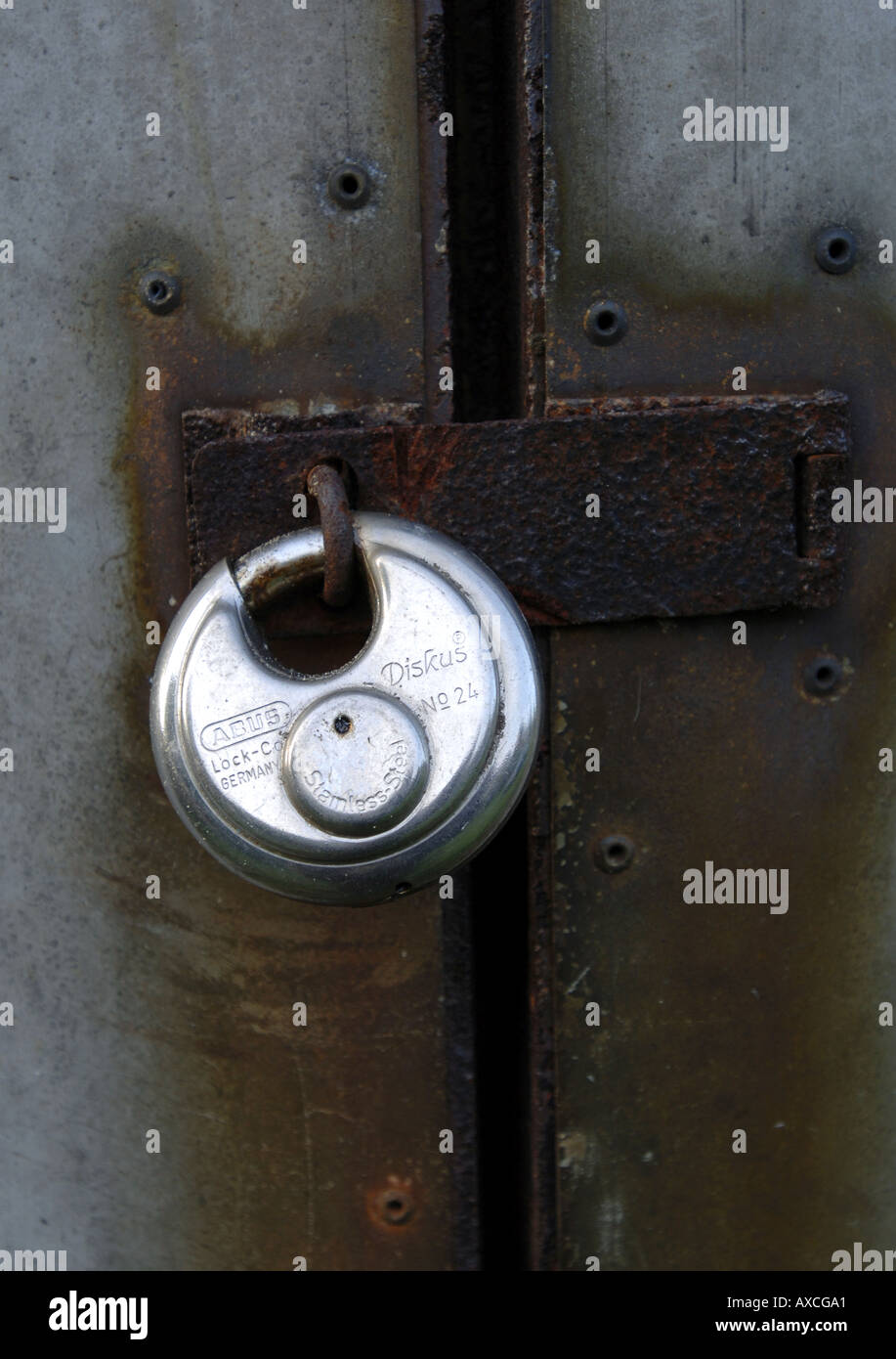 padlock securing a door shut Stock Photo - Alamy
