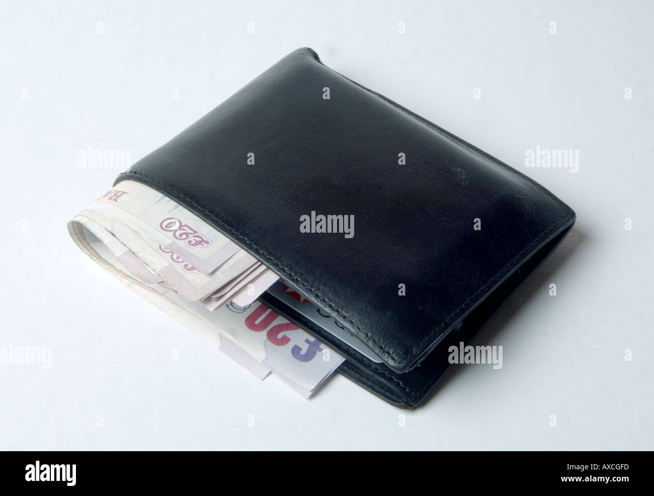 Money stuffed wallet hi-res stock photography and images - Alamy