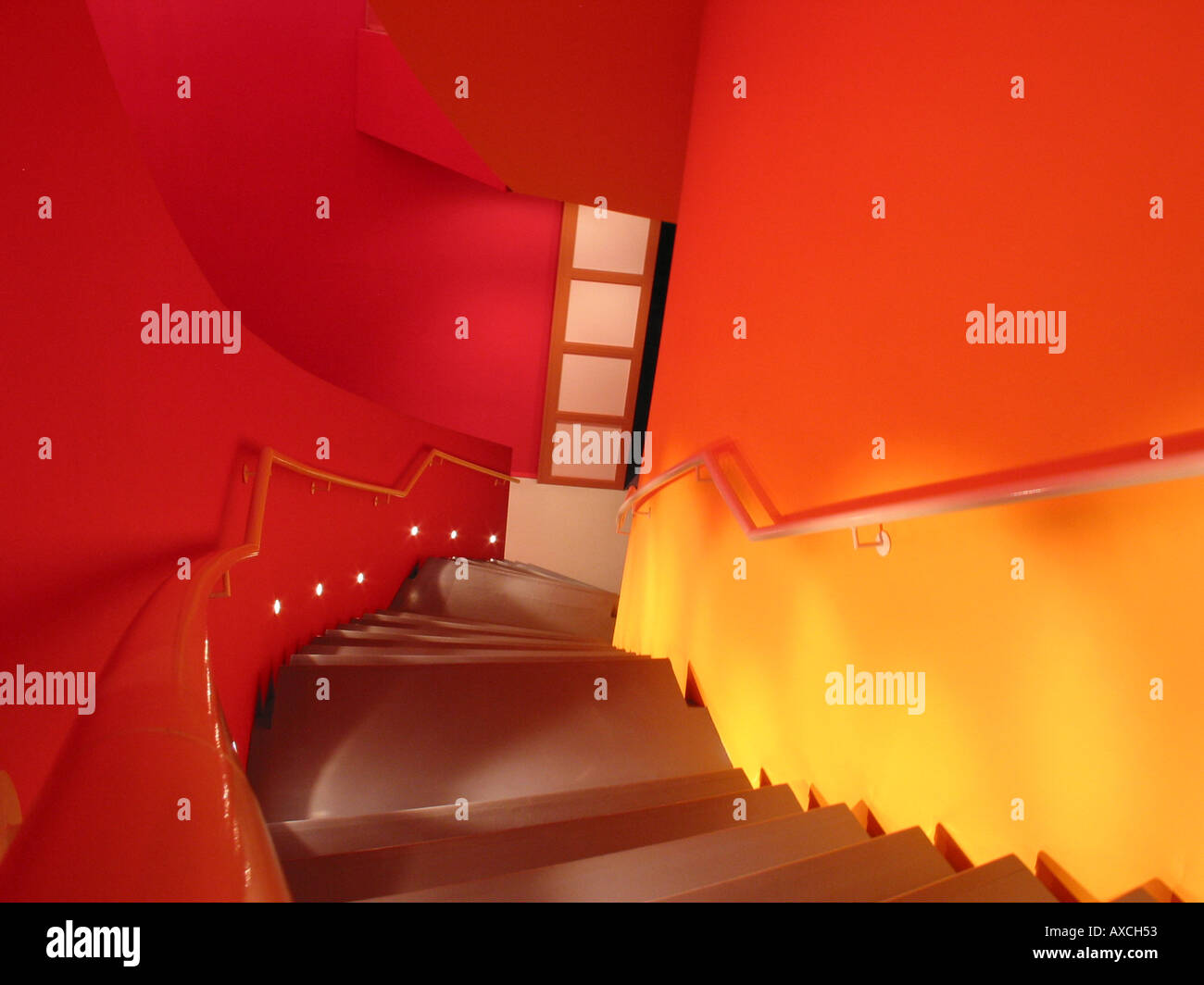 red interior of Groninger Museum with spiral staircase Groningen ...