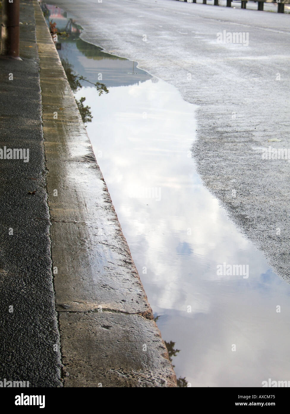 wet road and pavement Stock Photo - Alamy