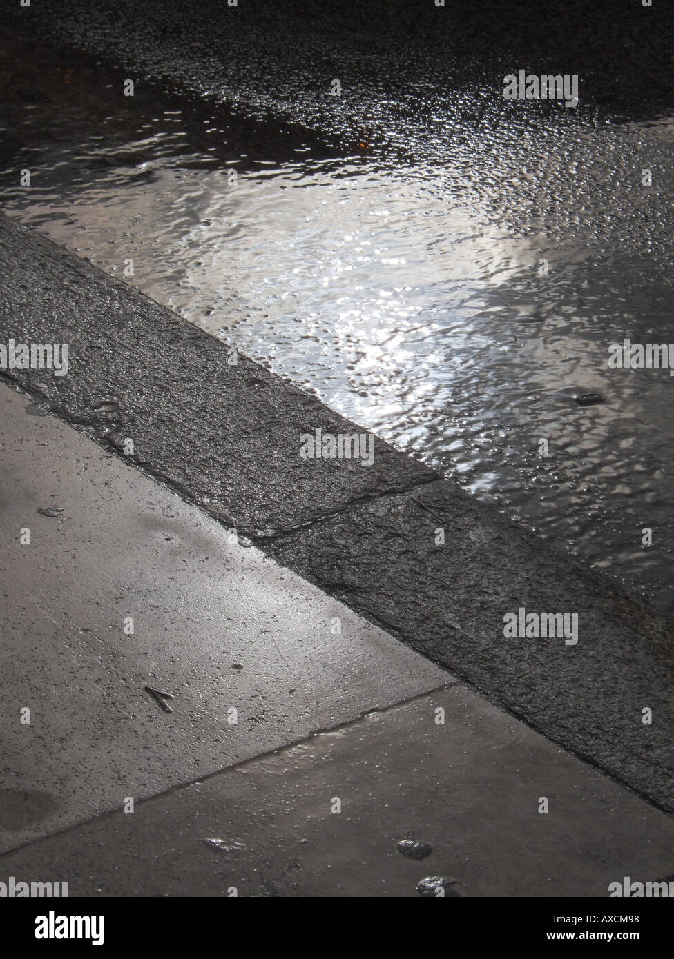 wet road and pavement Stock Photo - Alamy