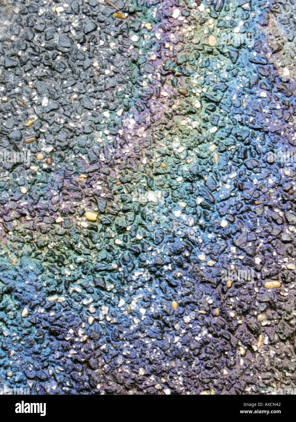 oil spilt on road surface Stock Photo - Alamy