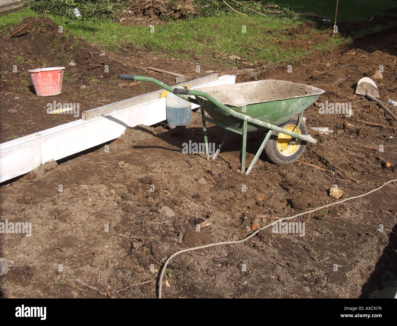 wheelbarrow on site Stock Photo - Alamy