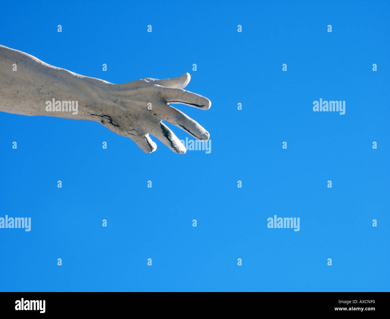 one statue hand reaching out in rome Stock Photo - Alamy