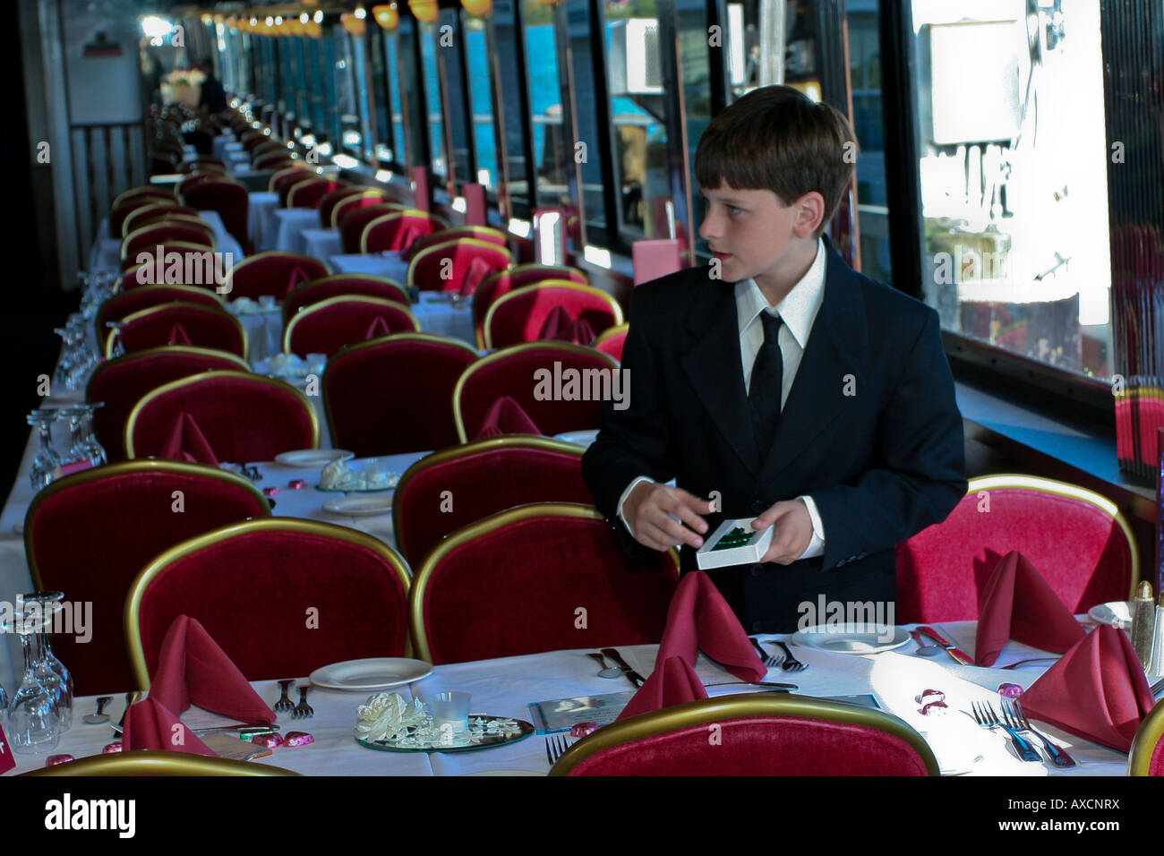 Young Boy Assisting with Wedding Preparations Stock Photo - Alamy
