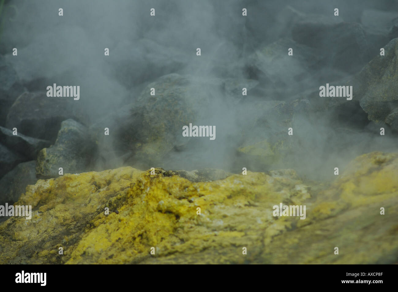 Volcanic rock with lava steaming Stock Photo - Alamy