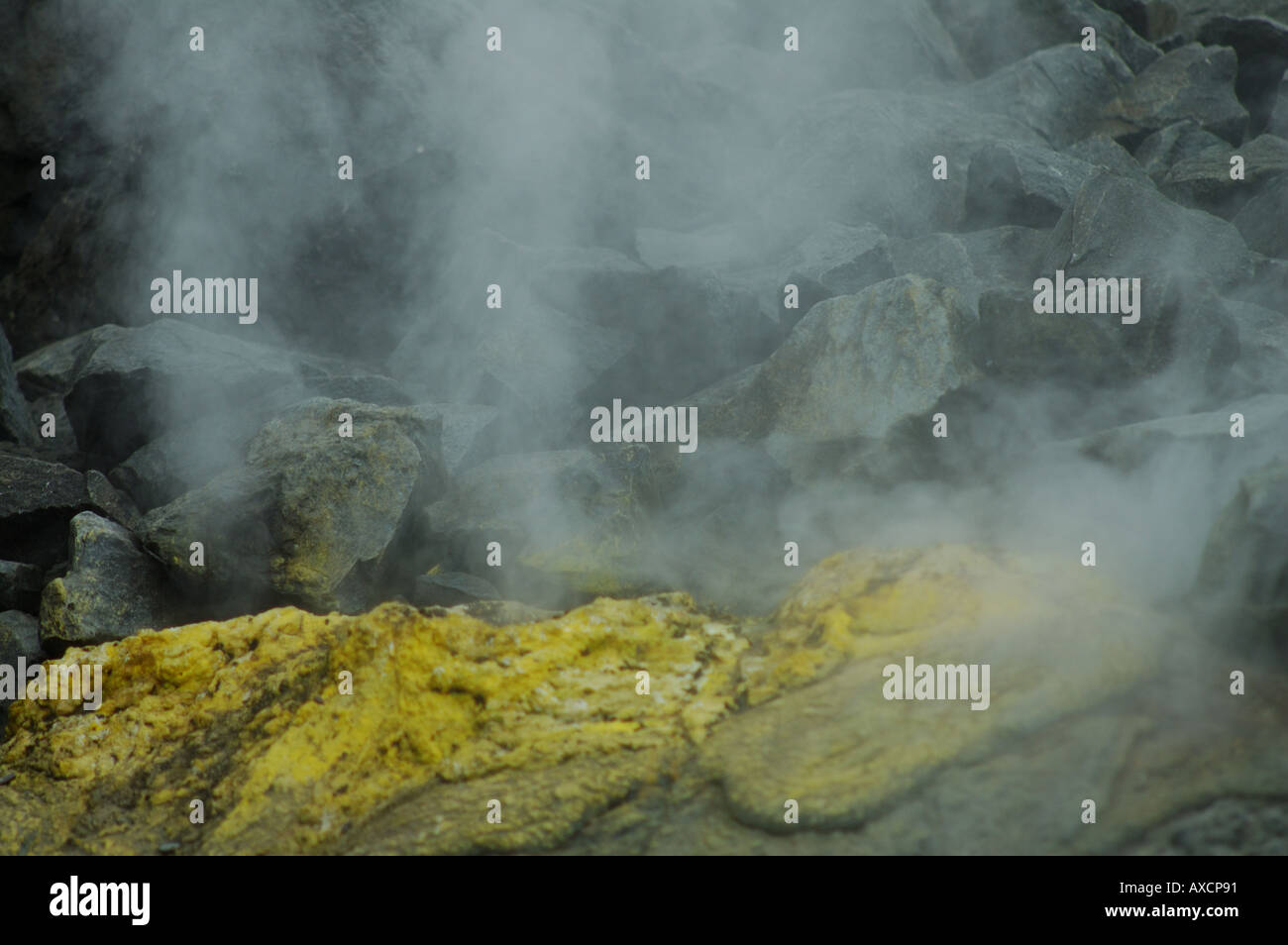 Volcanic rock with lava steaming Stock Photo - Alamy