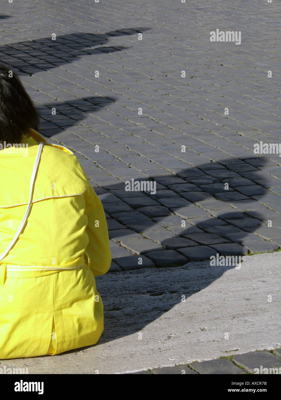 woman wearing yellow jacket Stock Photo - Alamy