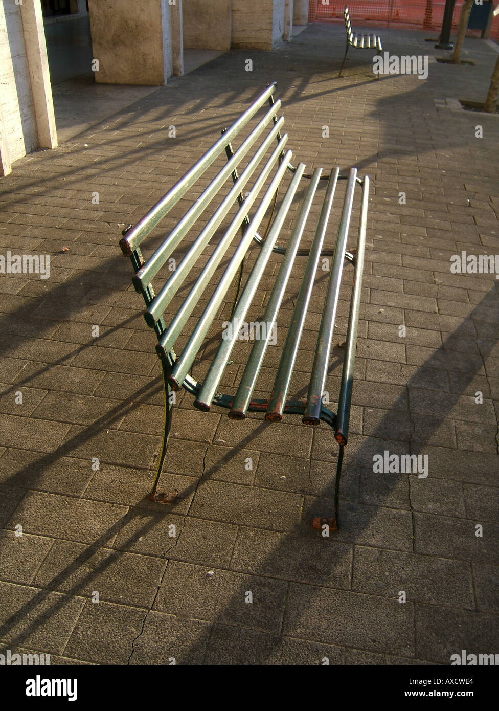 empty bench in town Stock Photo - Alamy