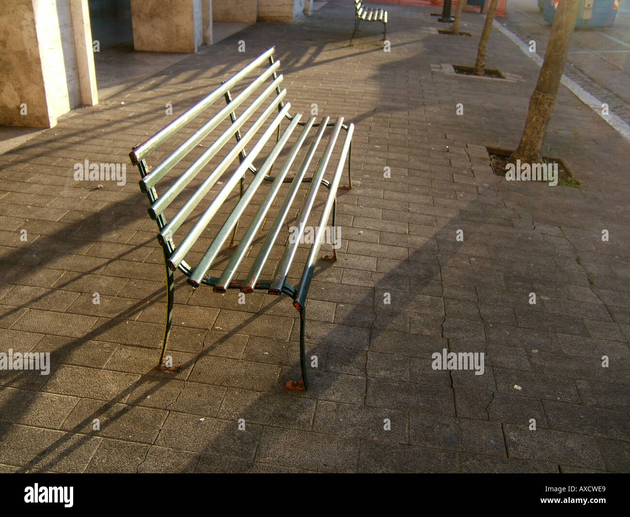 empty bench in town Stock Photo - Alamy
