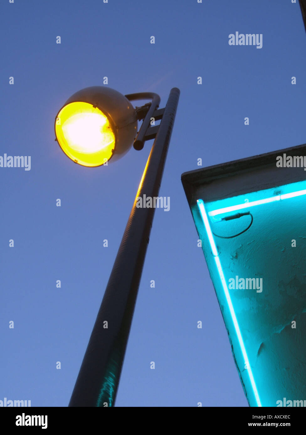 cool blue neon light on shop front Stock Photo - Alamy