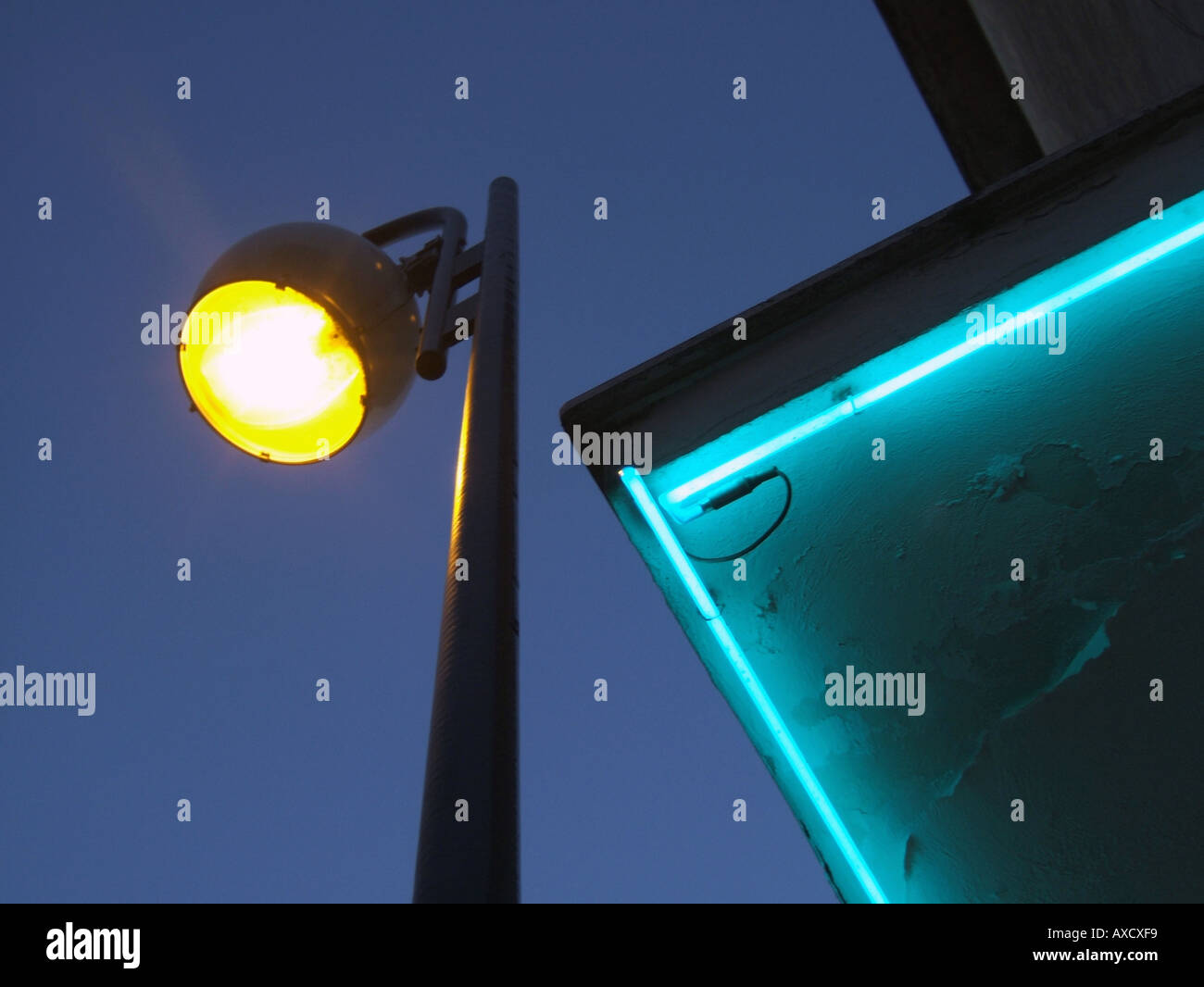 cool blue neon light on shop front Stock Photo - Alamy