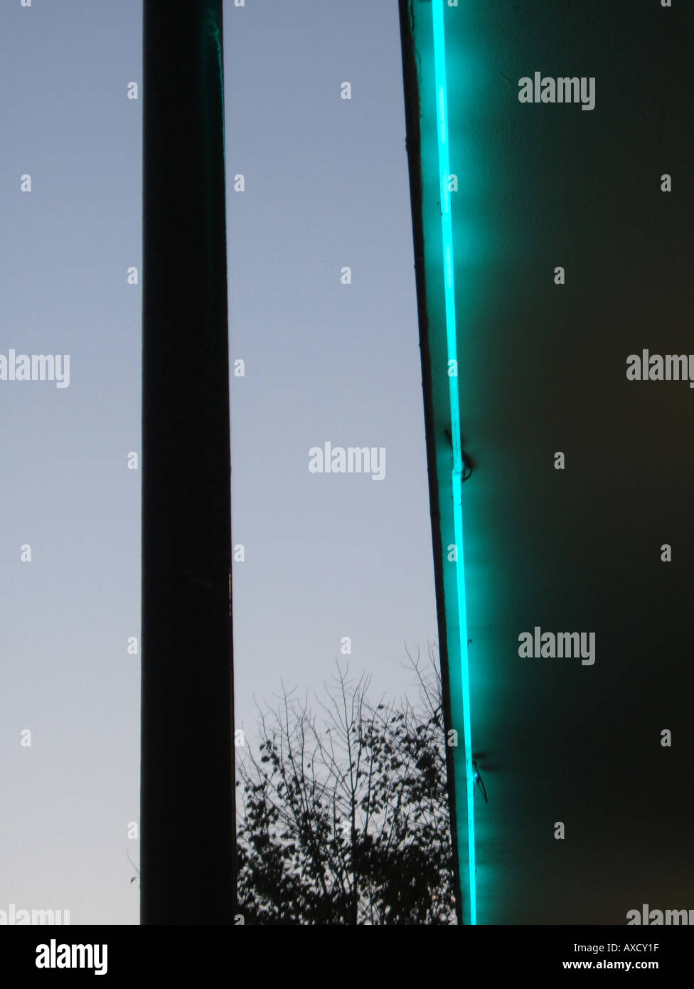 cool blue neon light on shop front Stock Photo - Alamy