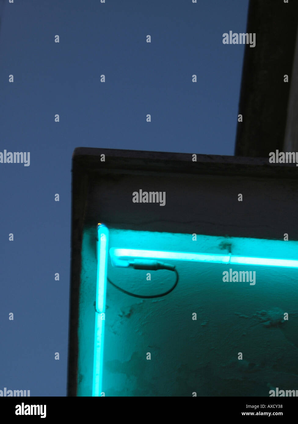 cool blue neon light on shop front Stock Photo - Alamy