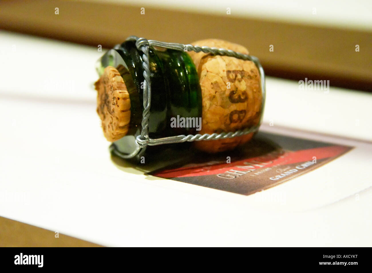 Mumm champagne cork after sabreing sabrage the bottle with wire cage ...