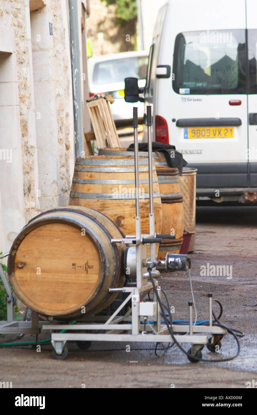 Oak barrel aging and fermentation cellar. Cleaning old barrels. The ...