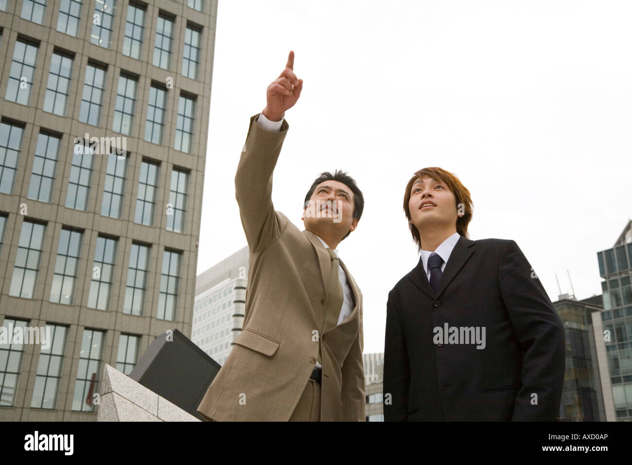 Two men pointing hi-res stock photography and images - Alamy