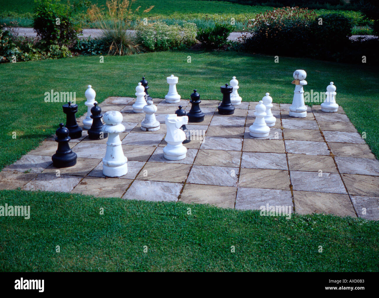 lifesize chess board on grass Stock Photo - Alamy