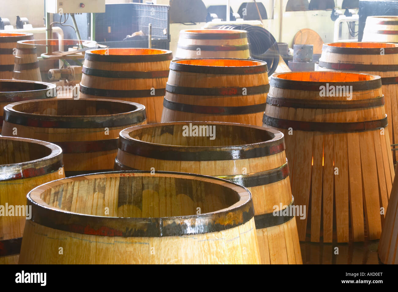 Burning, toasting the barrel with fire. Cooperage, barrel manufacturing ...