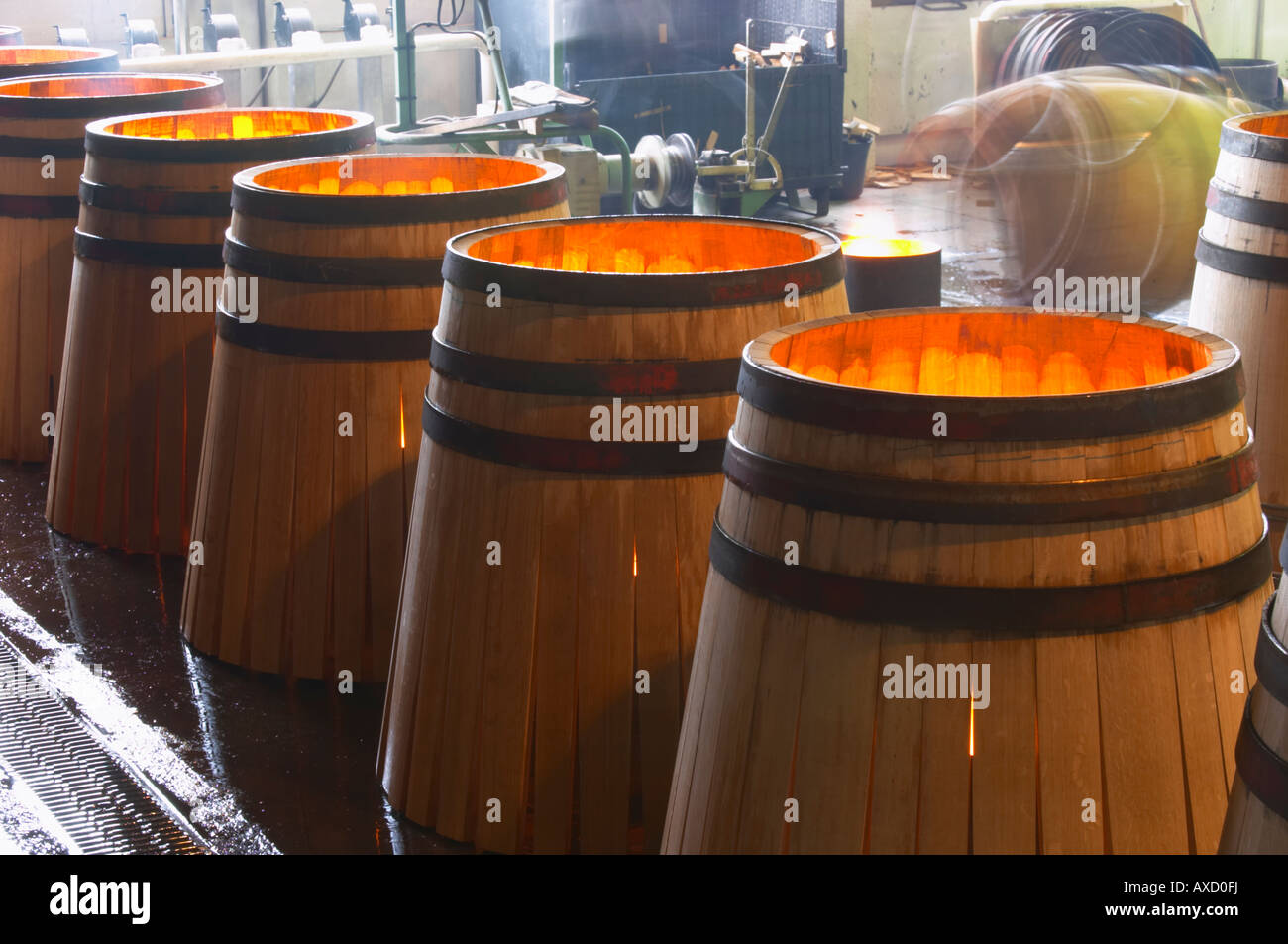 Burning, toasting the barrel with fire. Cooperage, barrel manufacturing ...
