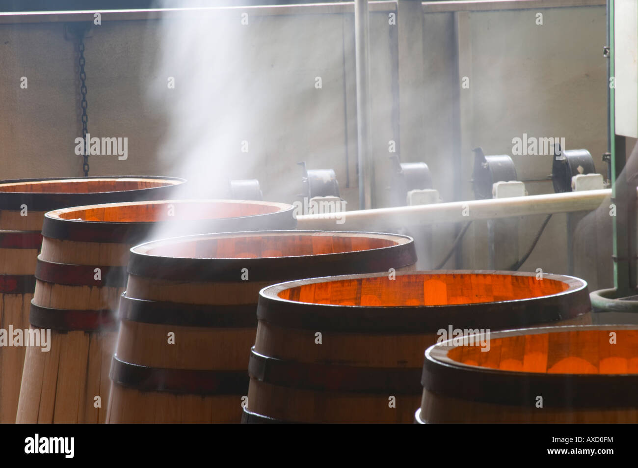 Burning, toasting the barrel with fire. Cooperage, barrel manufacturing ...