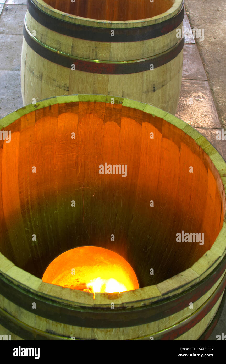 Burning, toasting the barrel with fire. Cooperage, barrel manufacturing ...