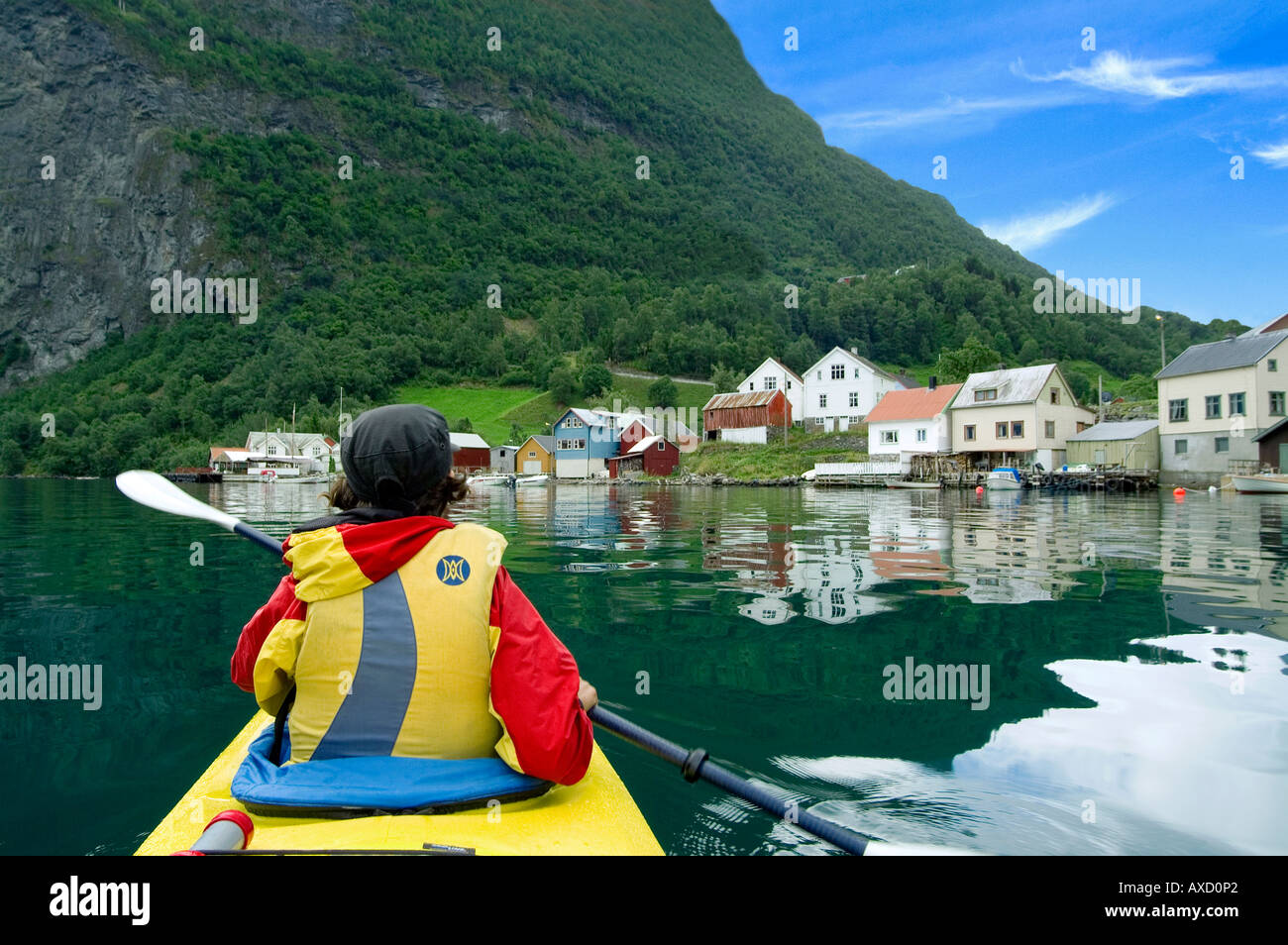 Kayaking in Naeroyfjord.Unesco World Heritage site.Undredal village ...