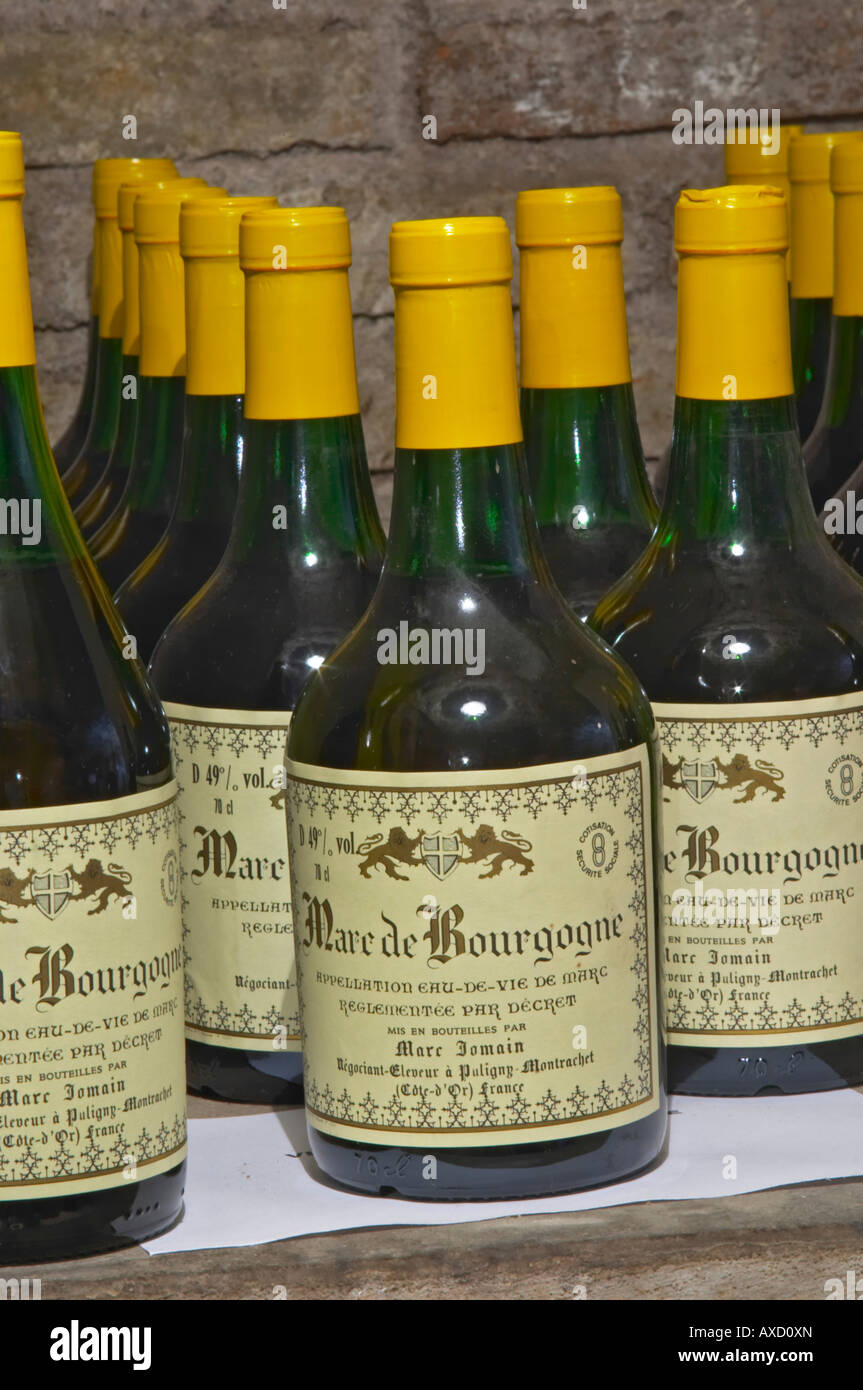 Bottles aging in the cellar. Marc de Bourgogne. Domaine Marc Jomain ...