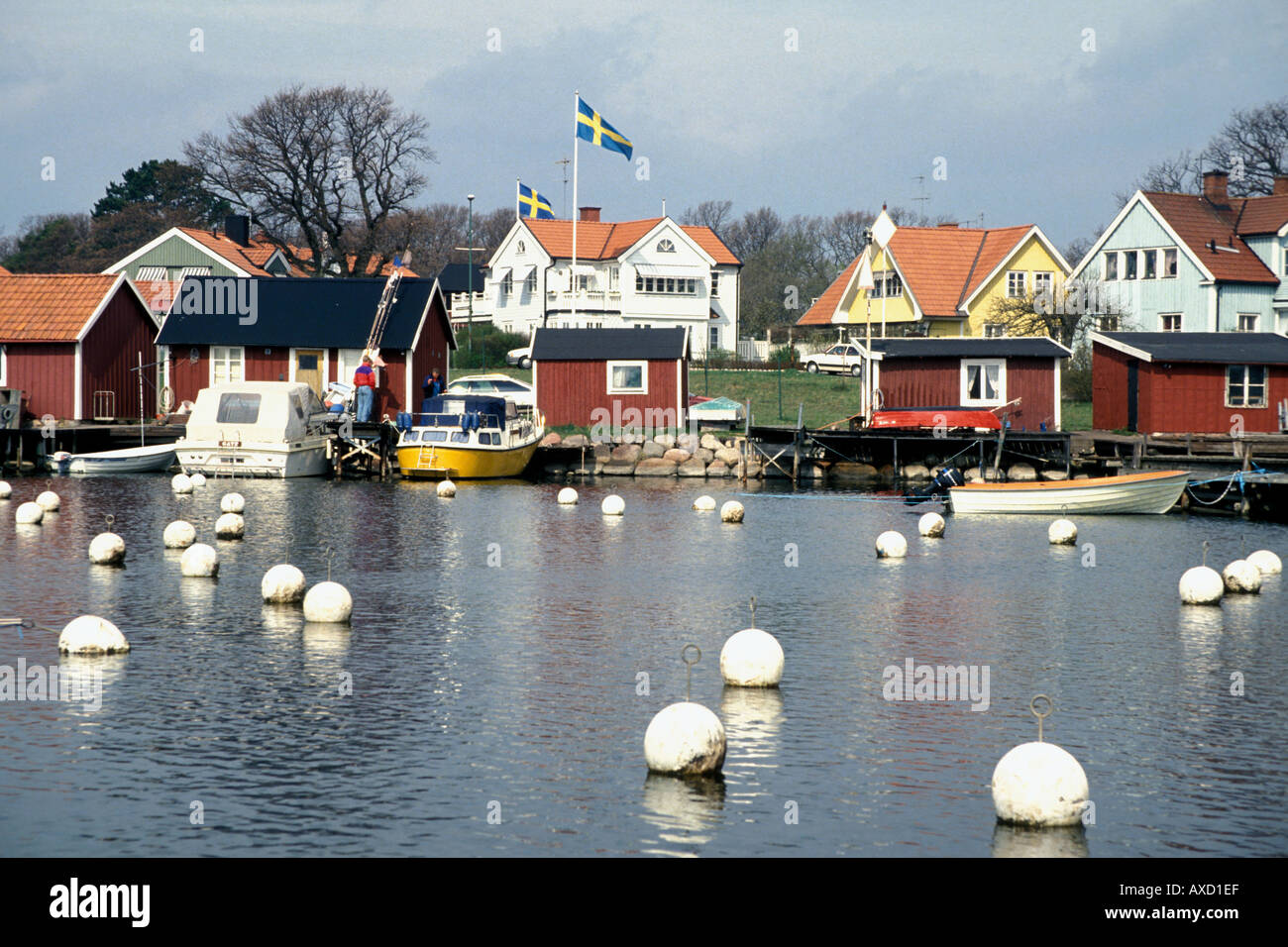 Europe Sweden Kalmar Stenso harbor harbour flag water moorings boats ...