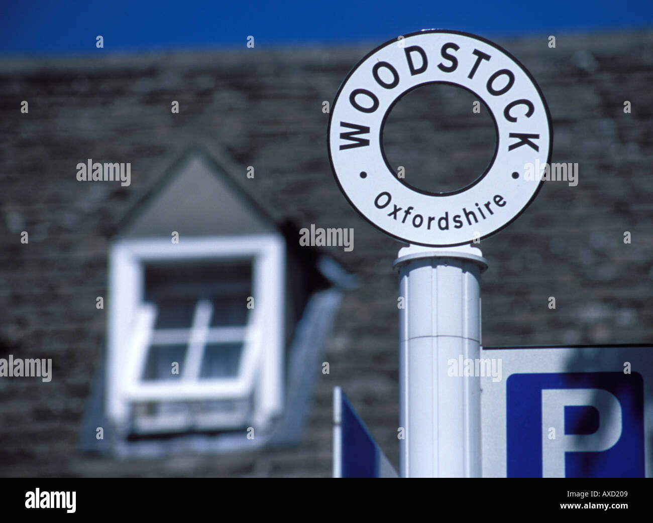 Woodstock Sign with dormer and roof in background Stock Photo - Alamy