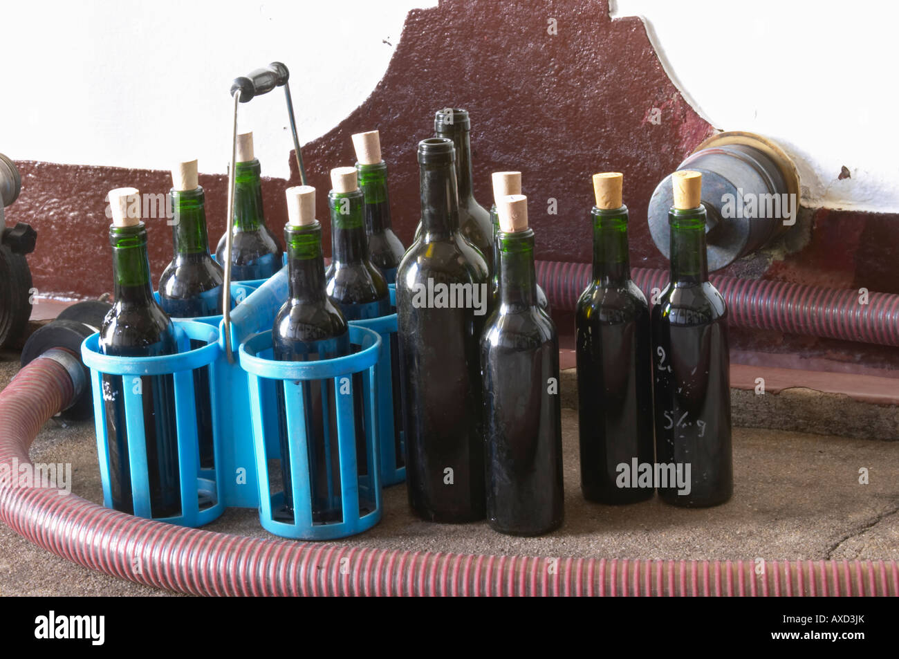 Transporting bottles in a carrying basket. Chateau la Grace Dieu les ...