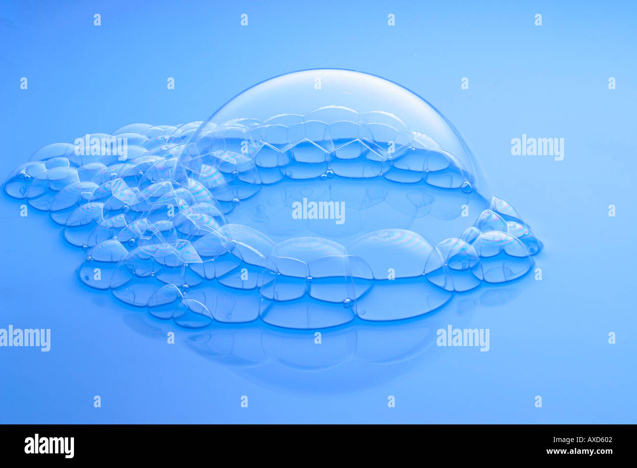 soap bubbles floating swimming on water surface Stock Photo - Alamy