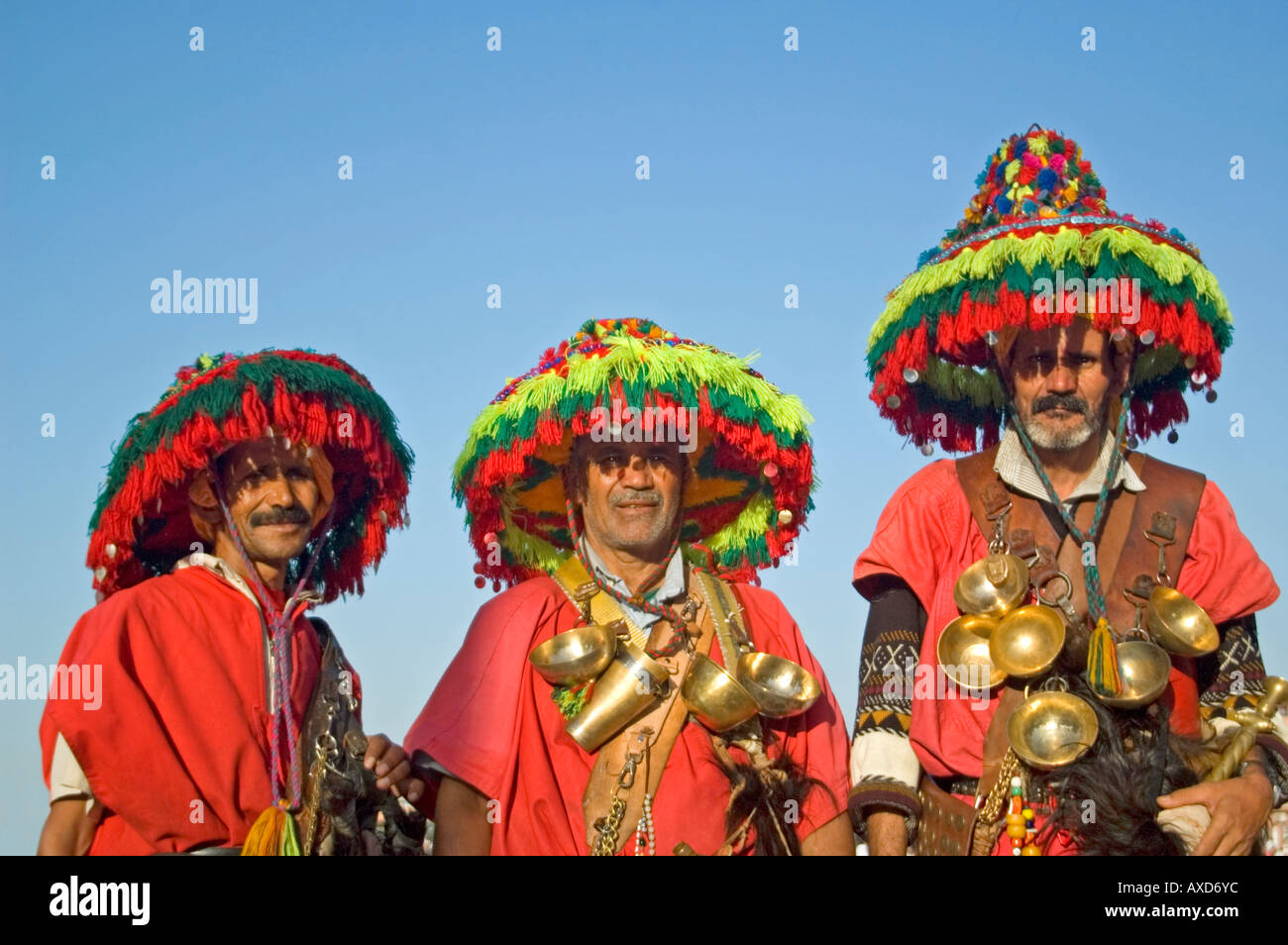 Horizontal portrait of traditional water carriers in their colourful ...