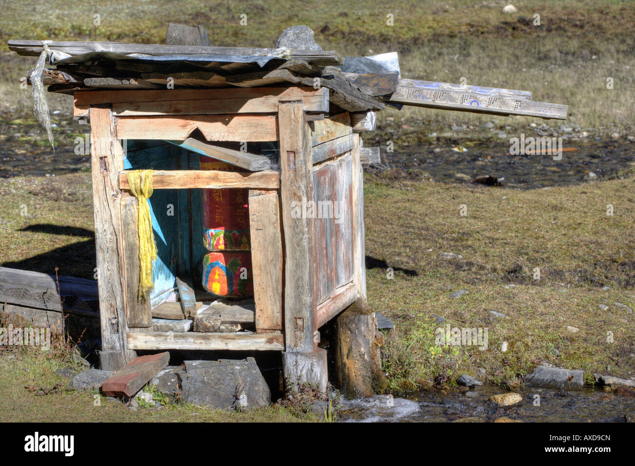 Colorful, water-powered prayer wheel, Yubeng, Yunnan, China Stock Photo ...